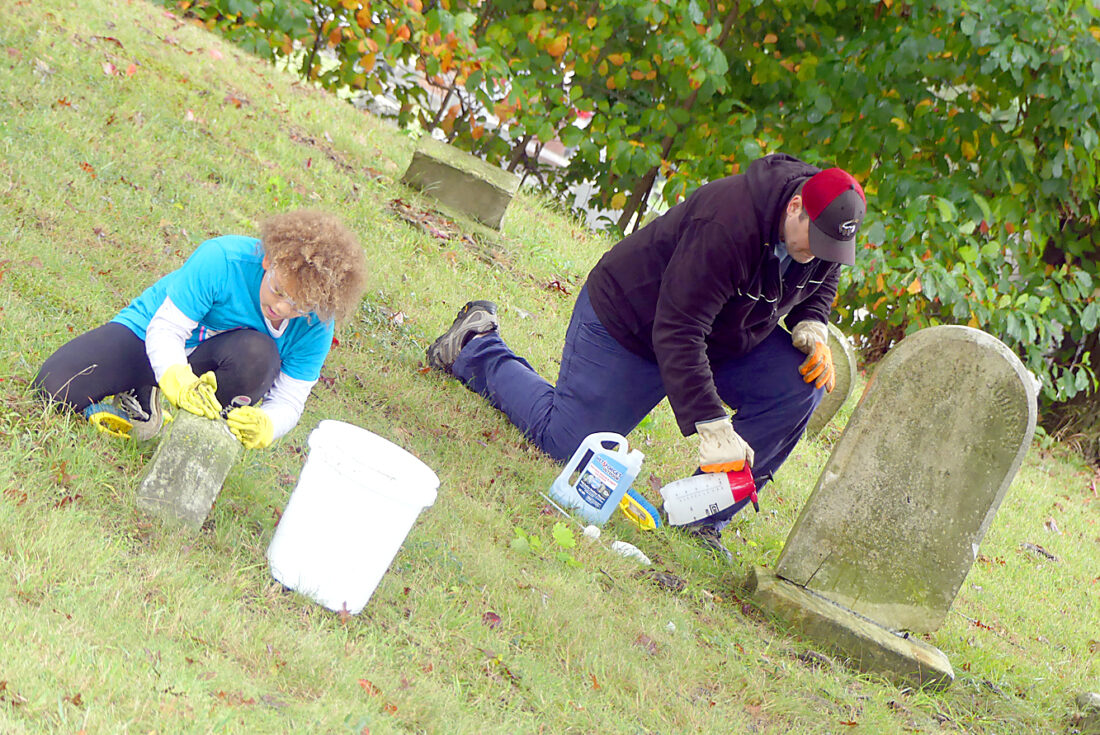 Shine a light: Volunteers turn out to help clean up historic cemetery ...